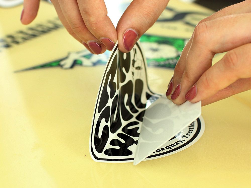 How to Put Stickers on a Surfboard - Wetsuit Wearhouse Blog